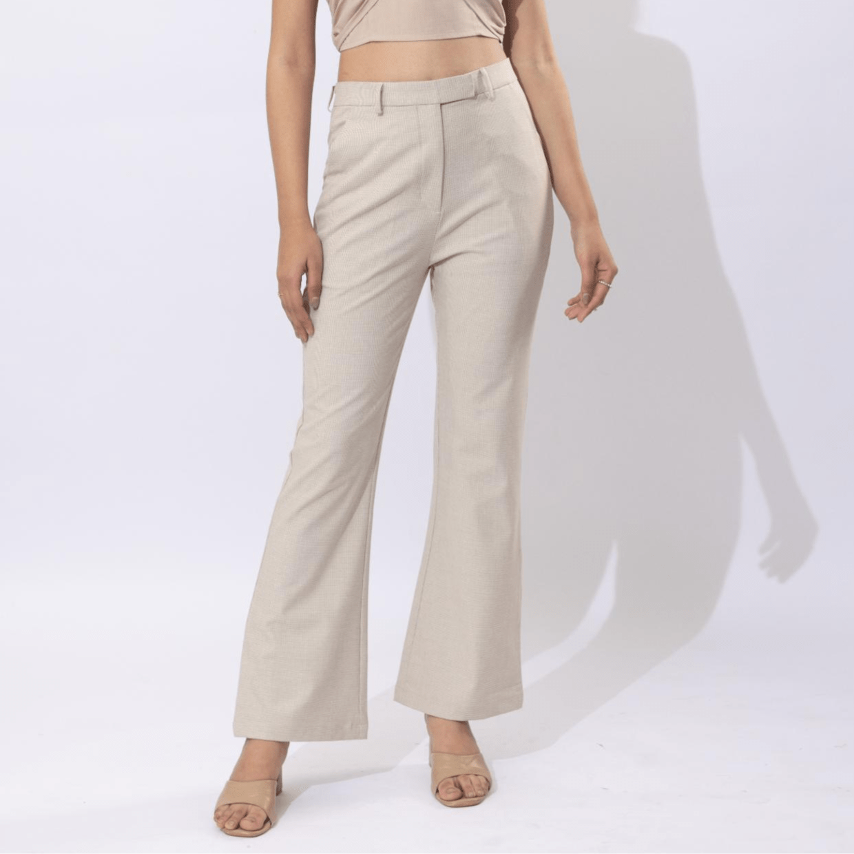 Beige check check formal flare pants for women casual and office wear.